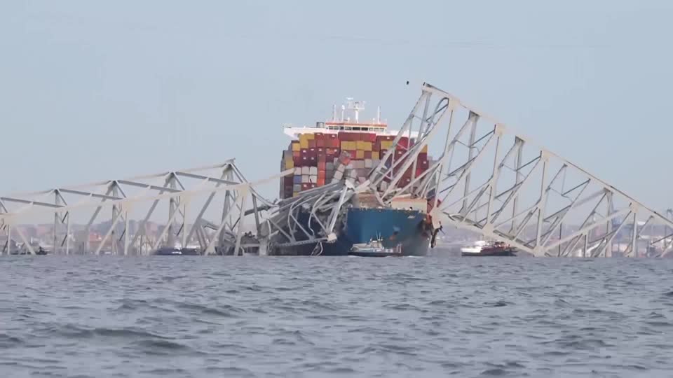 Six workers presumed dead after crippled cargo ship knocks down ...